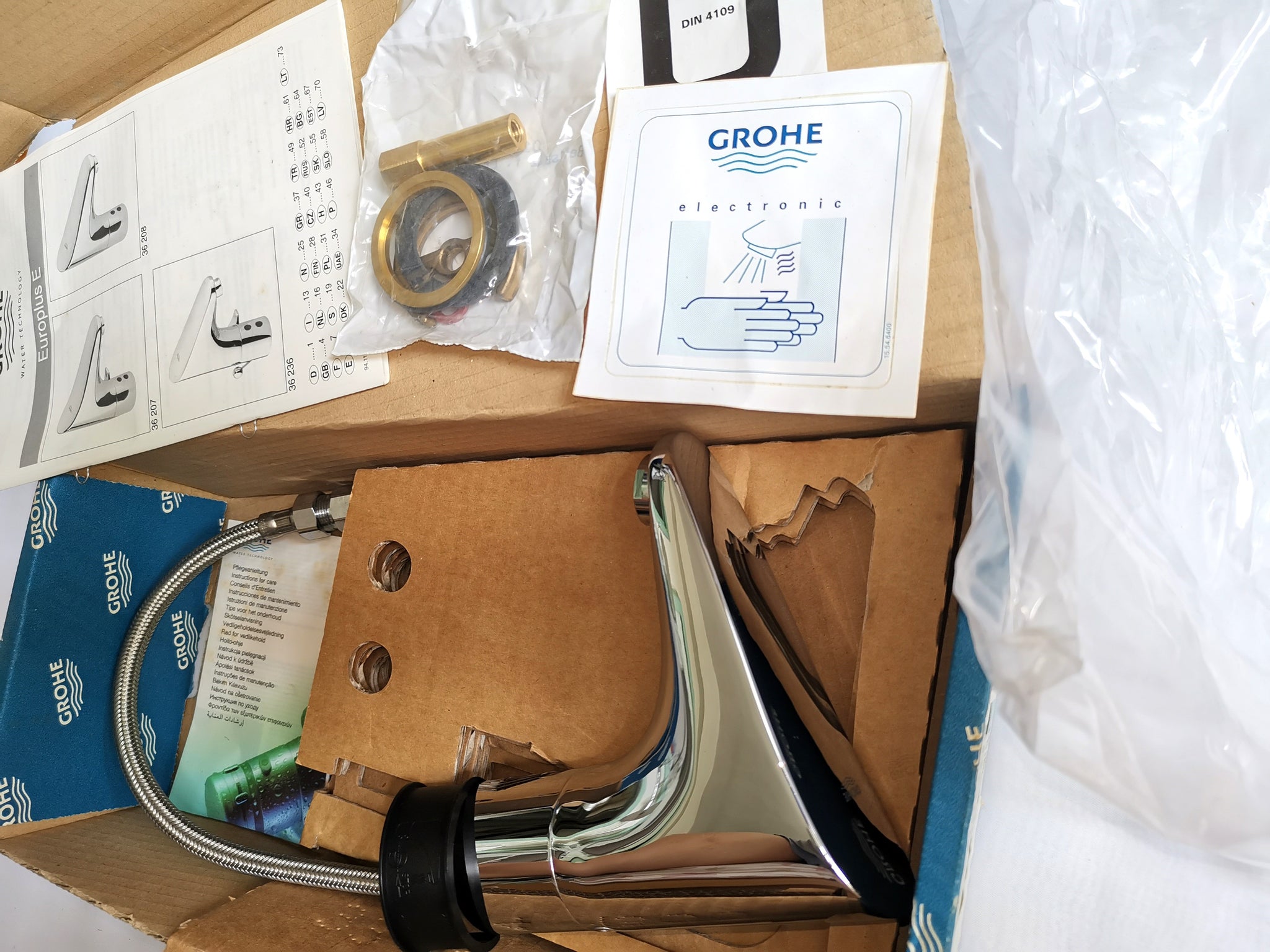 Grohe "Europlus E" 36208000 Infra-red electronic basin mixer w/6V lith ...